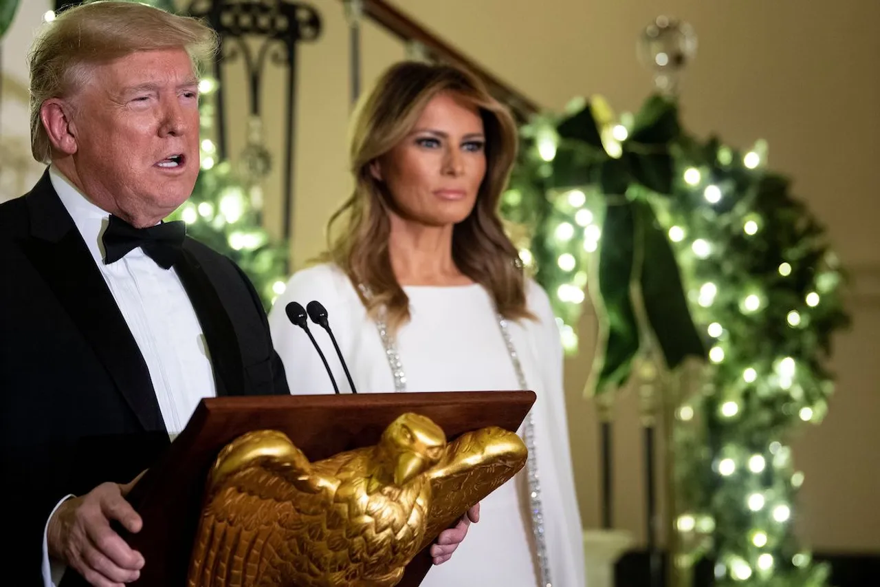 Melania Stuns In Gorgeous Vanilla Coat And Pants Combo At Joint Base ...