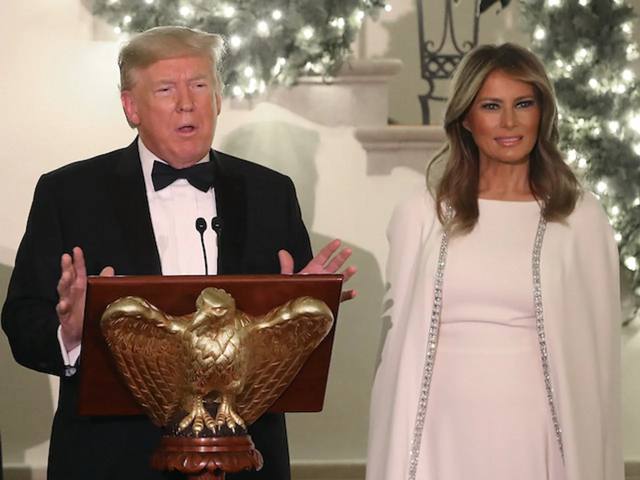 Melania Stuns In Gorgeous Vanilla Coat And Pants Combo At Joint Base ...