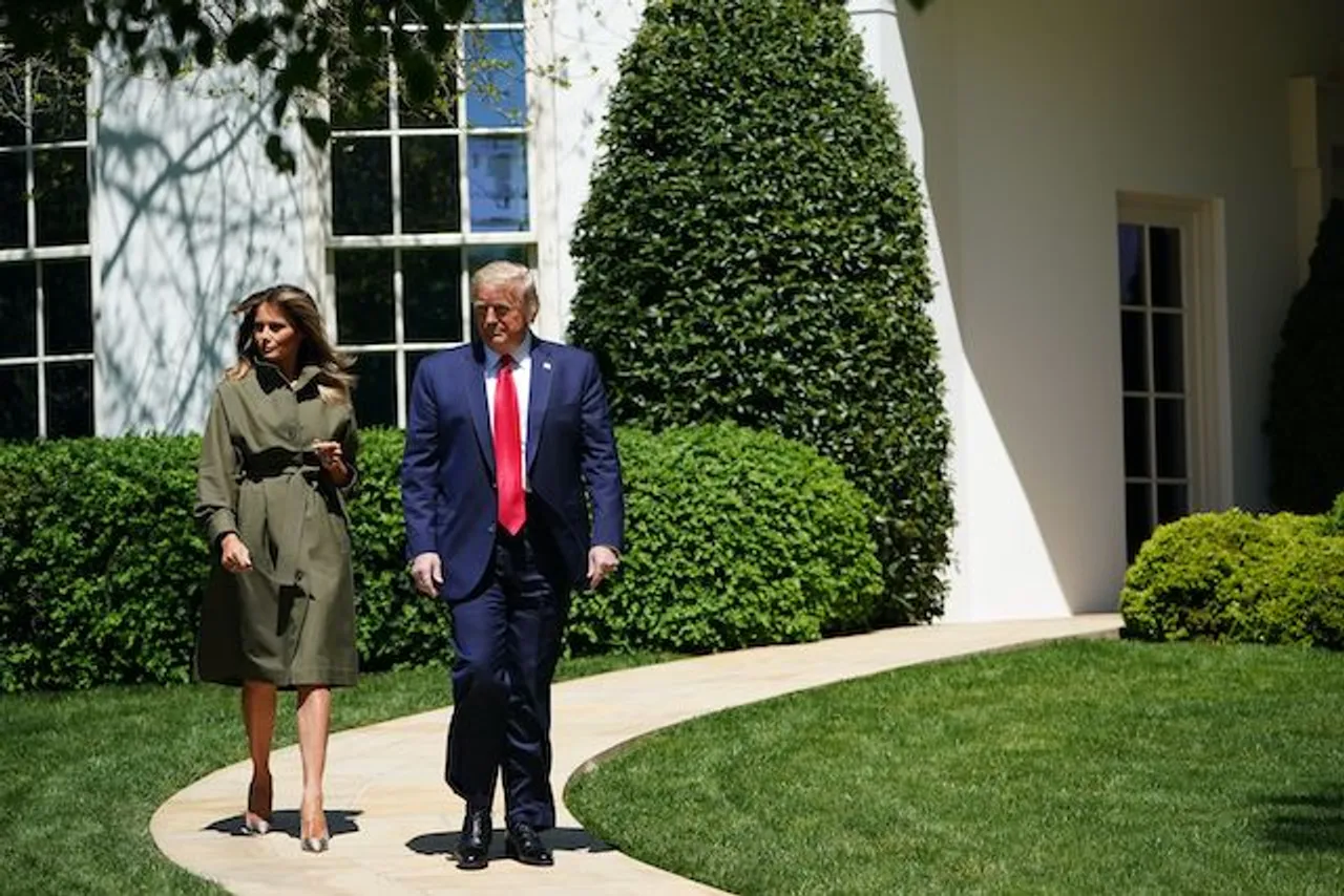 Melania Turns Heads In Gorgeous Green Coat Dress At WH Tree Planting ...