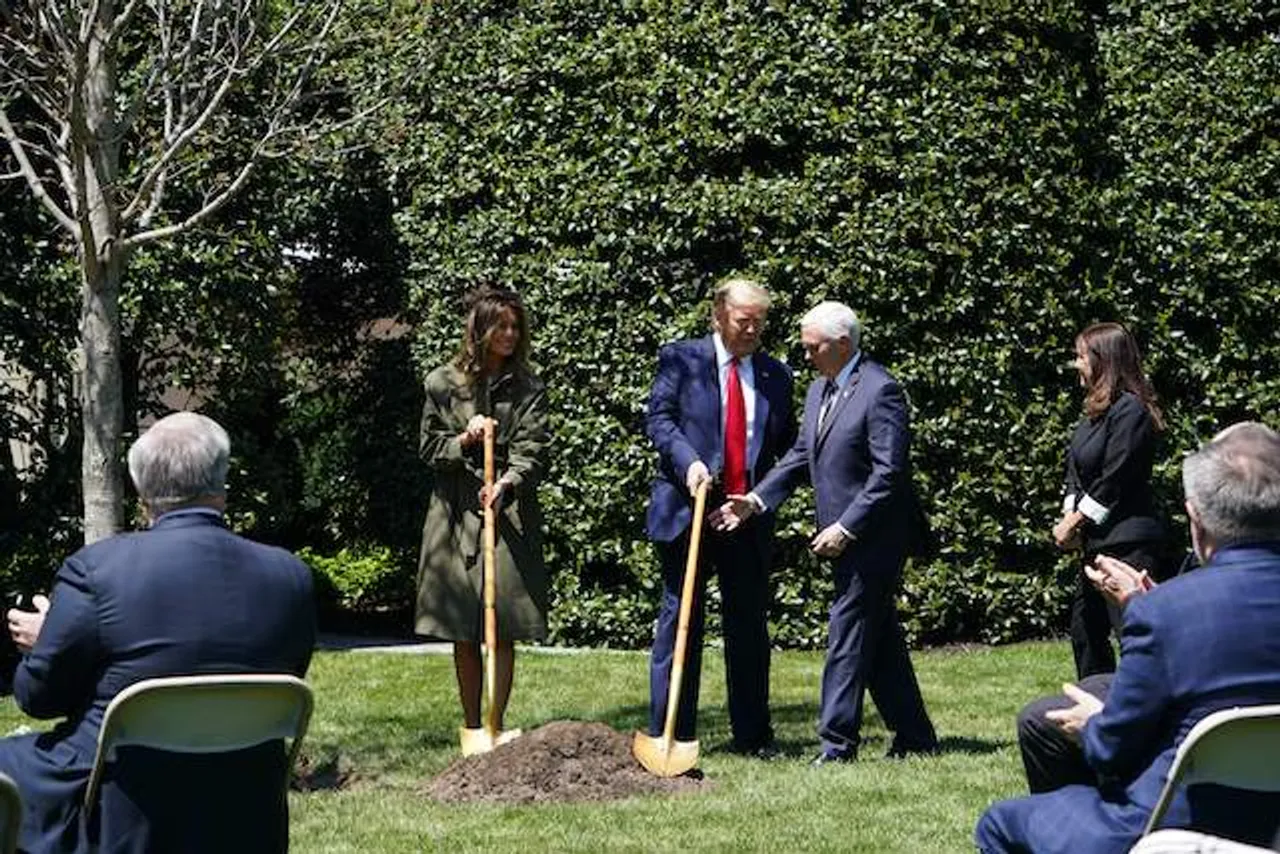 Melania Turns Heads In Gorgeous Green Coat Dress At WH Tree Planting ...