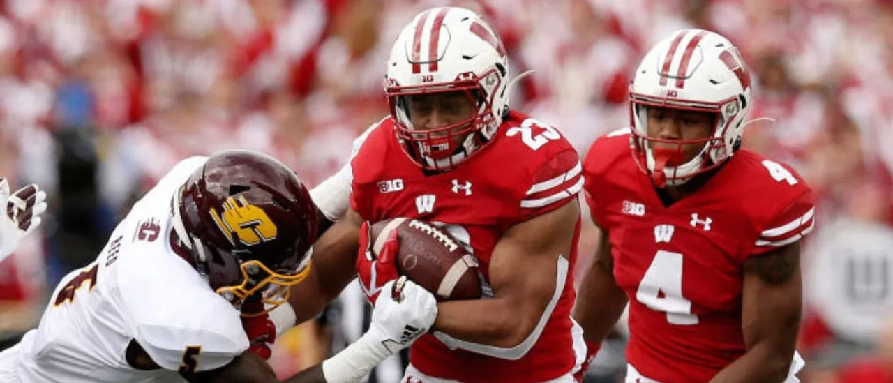 Wisconsin Badgers Release Look At Old School Uniforms For Northwestern ...