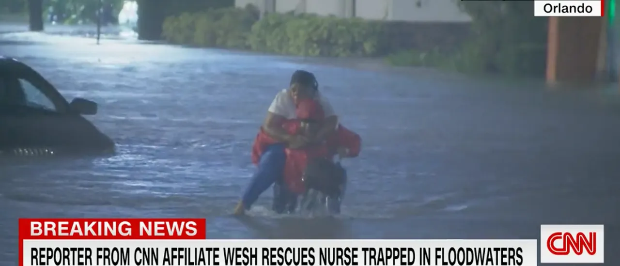 Reporter Rescues Stranded Woman In Rising Flood Waters Live On TV | The ...