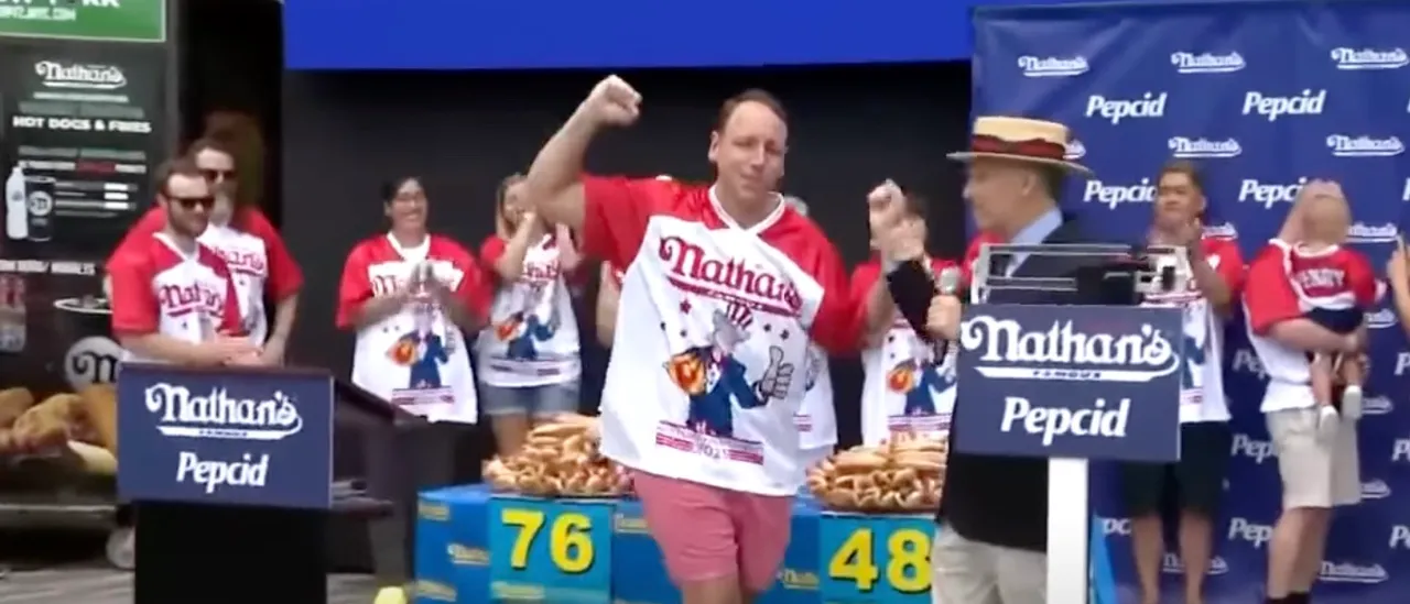 Joey Chestnut Wins 16th Mustard Belt, Eating More Than 60 Hot Dogs ...