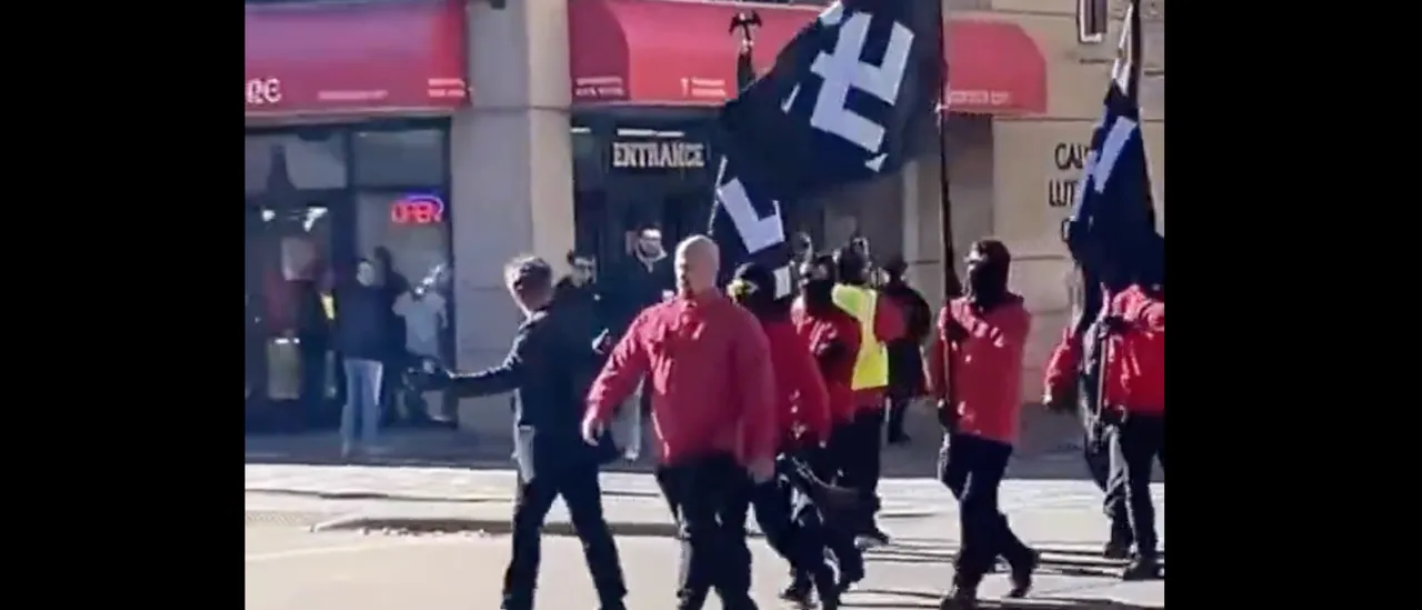 Neo-Nazi Group Marches Through Downtown Madison, Wisconsin, Waving ...