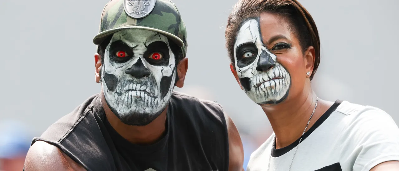 Raiders, Chargers Fans Get Into Crazy Brawl That Sees One Man Bloodied ...