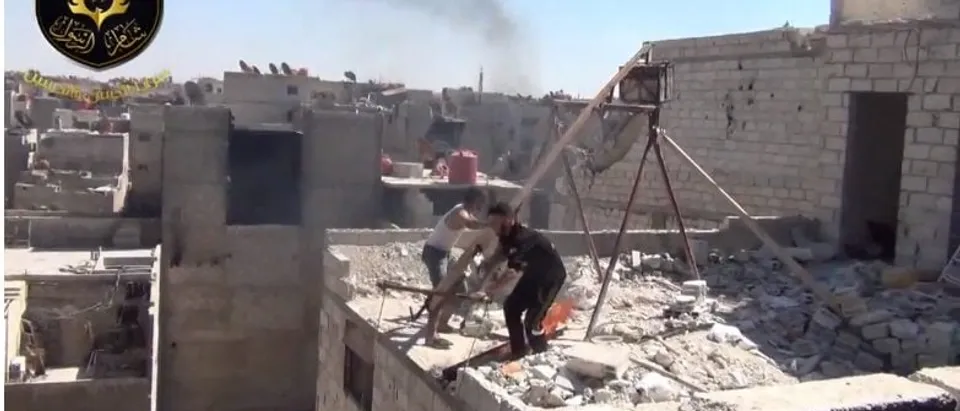 Syrian Rebels Are Fighting Assad With A Trebuchet That Launches Flaming ...